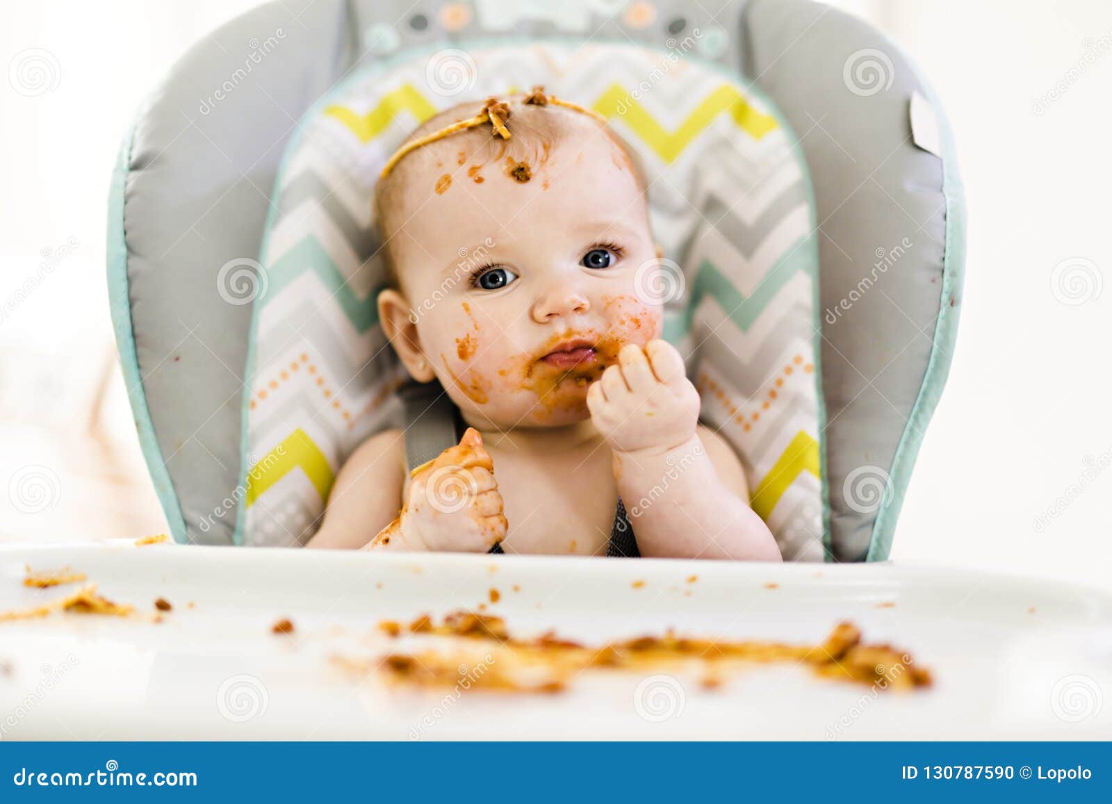 Little Baby Eating Her Dinner and Making a Mess Stock Photo - Image of ...