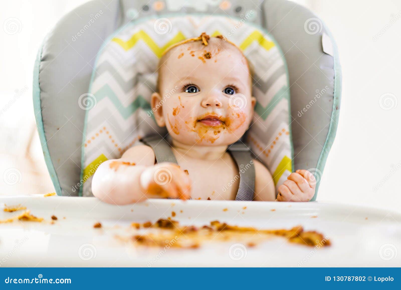 Little Baby Eating Her Dinner and Making a Mess Stock Photo - Image of ...