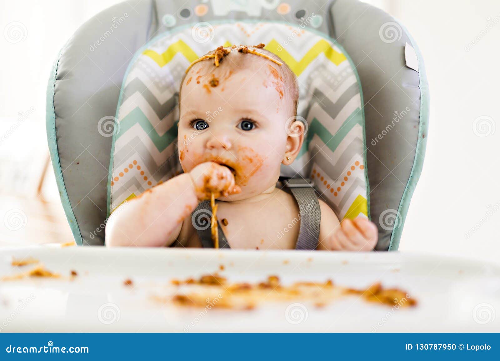 Little Baby Eating Her Dinner and Making a Mess Stock Photo - Image of ...