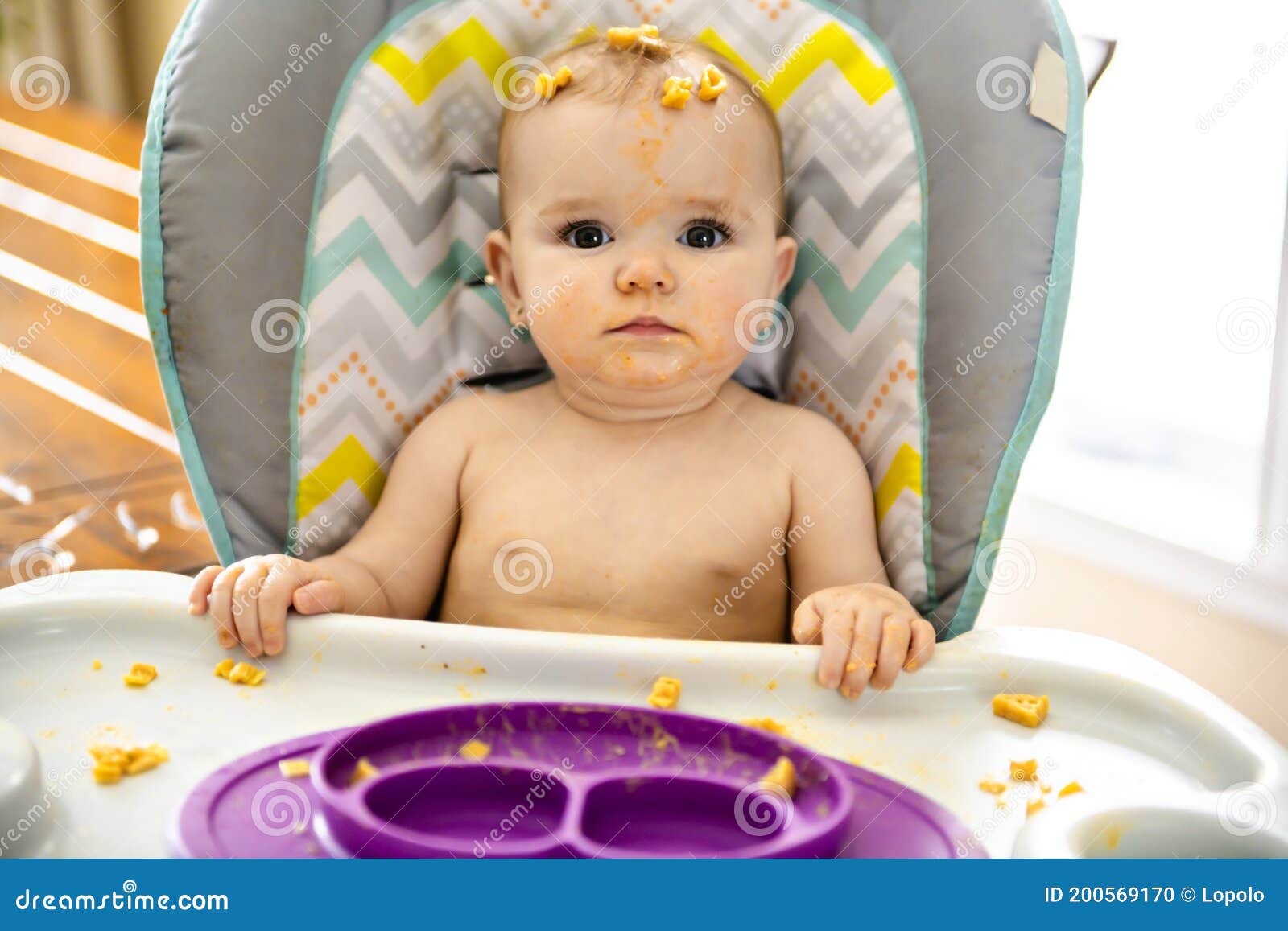 Little Baby Eating Her Dinner and Making a Mess Stock Photo - Image of ...