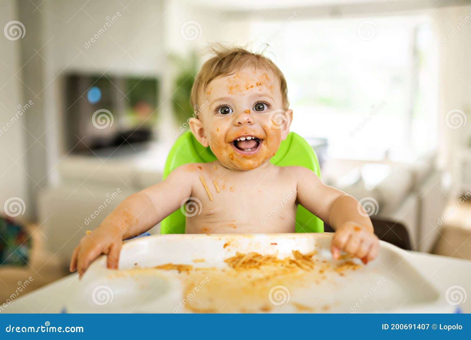 A Little Baby Eating Her Dinner and Making a Mess Stock Image - Image ...