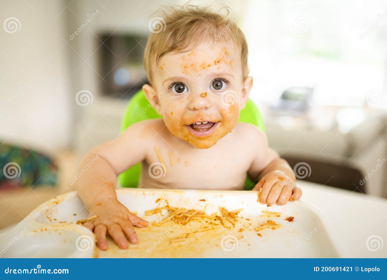 A Little Baby Eating Her Dinner and Making a Mess Stock Image - Image ...