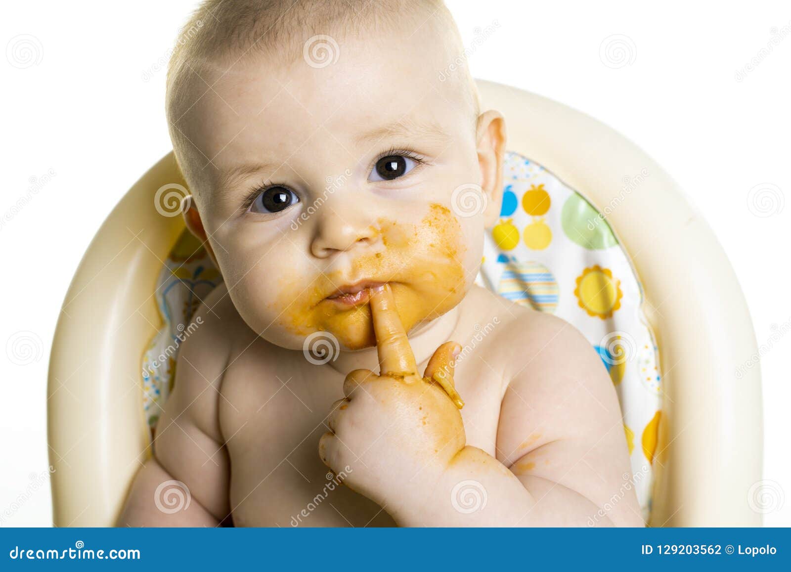 Little Baby Eating Her Dinner Spaghetti and Making a Mess on His Face ...