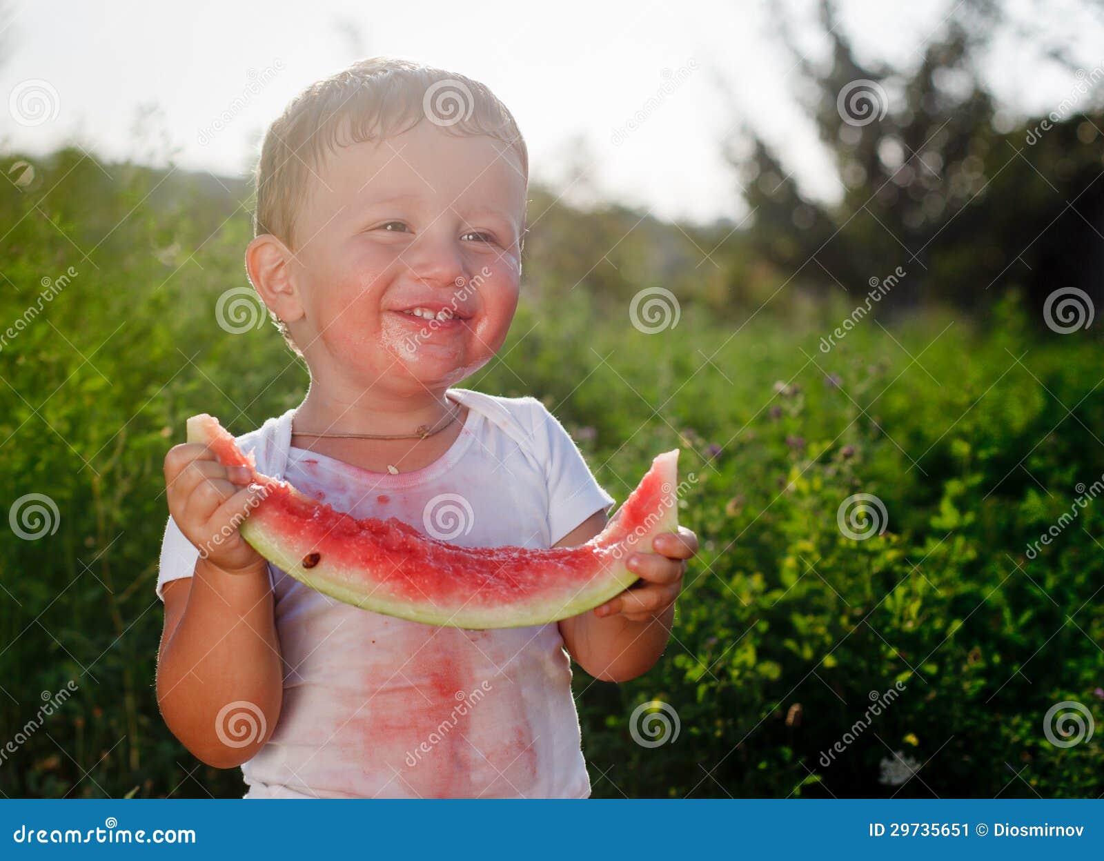 Little Baby Eating Watermelon Outdoors Stock Image - Image of jeans ...