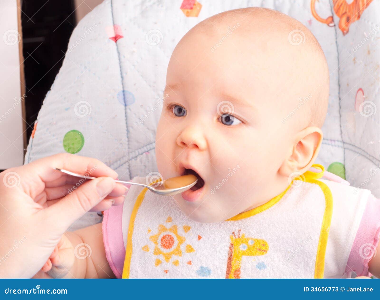 Little Baby Feeding with a Spoon Stock Image - Image of baby, care ...