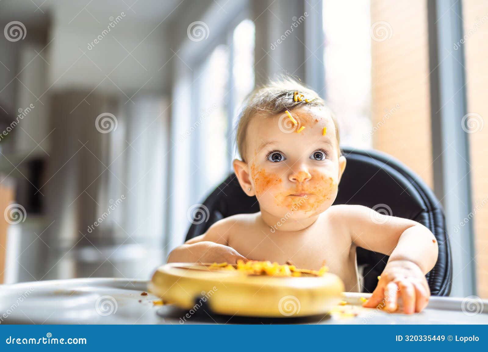 Little Baby Girl Eating Her Dinner and Making a Mess Stock Image ...