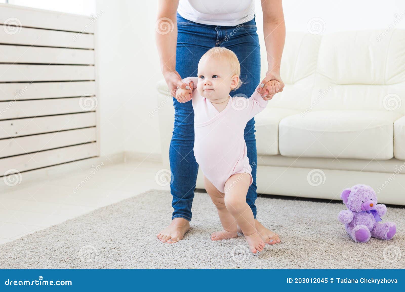 Little Baby Girl First Steps with the Help of Mom Stock Image - Image ...