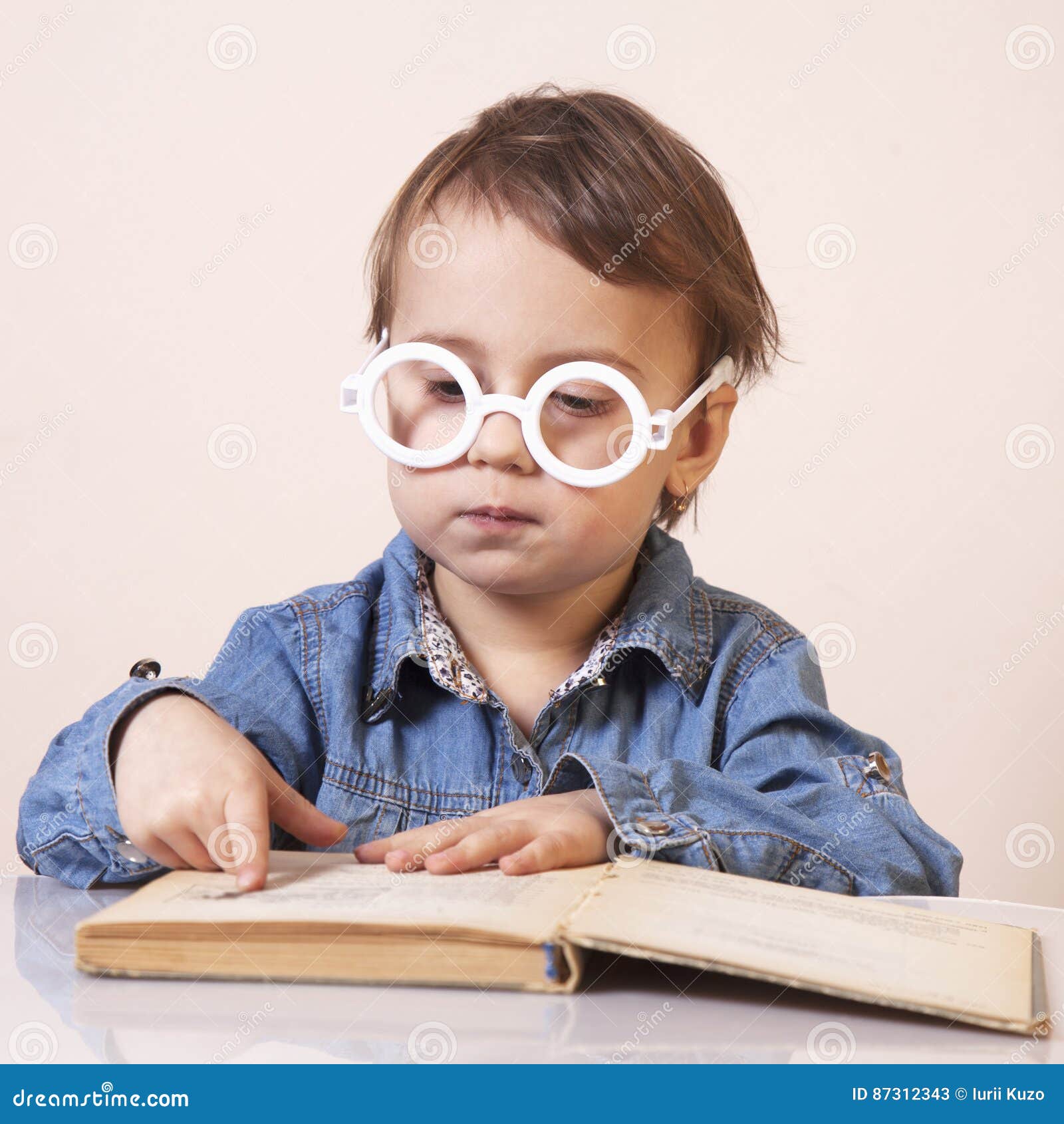 Little Baby Girl Reading a Book Development, Education Stock Image ...