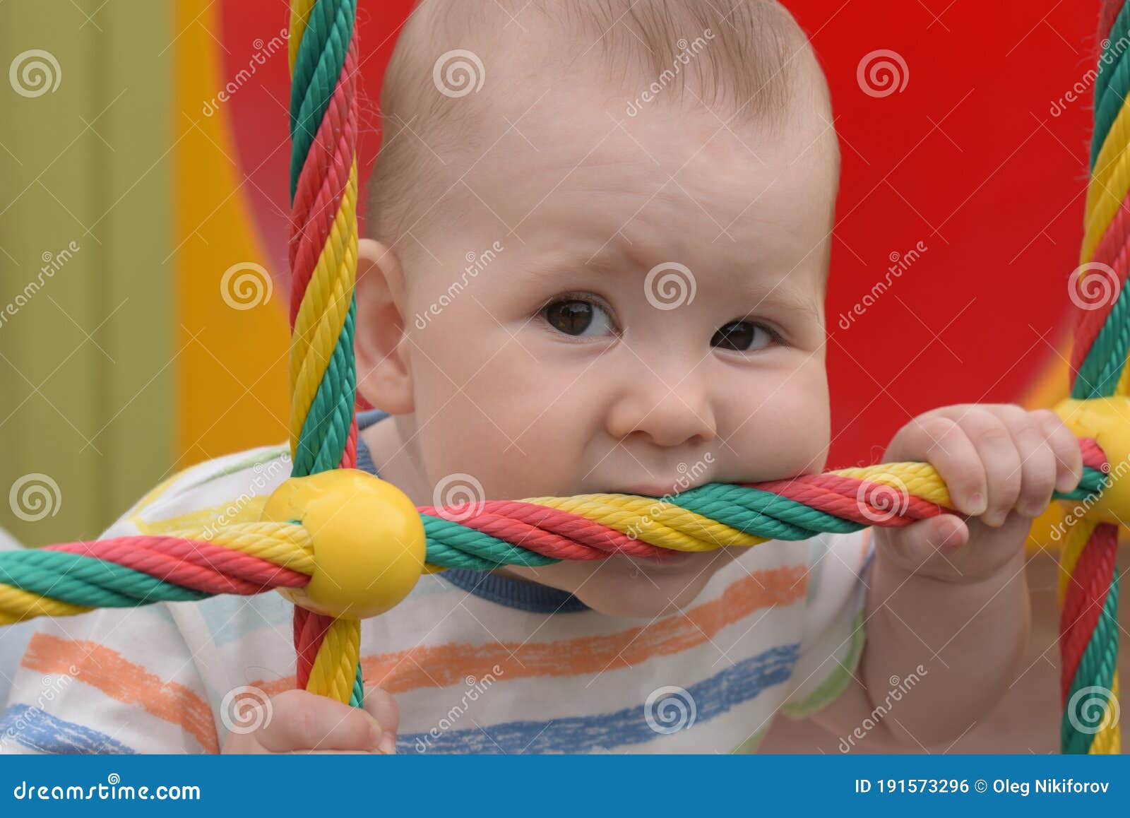 Little baby gnaws rope stock photo. Image of cute, person - 191573296