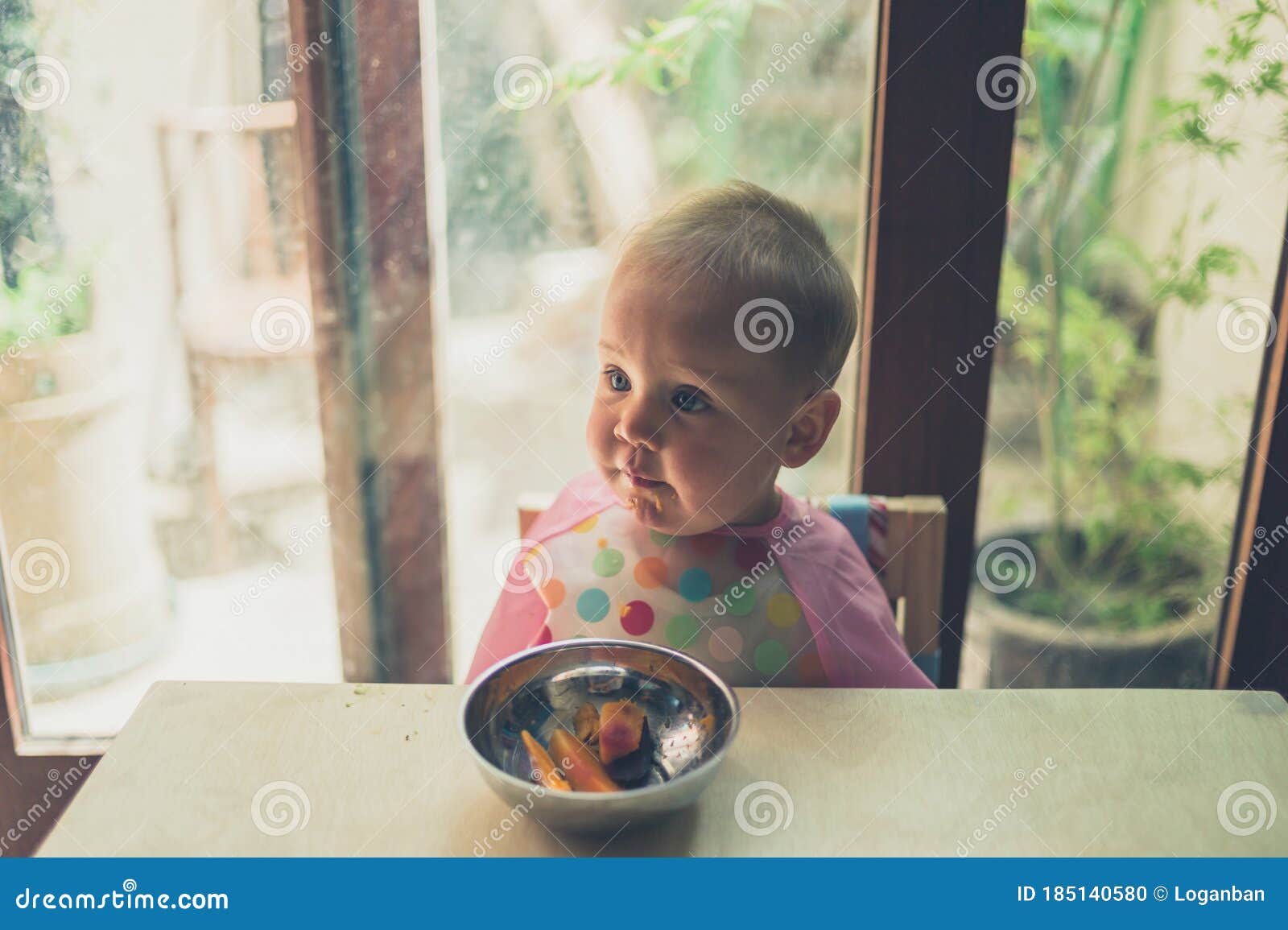 Little Baby Learning How To Eat at Table Stock Photo - Image of person ...