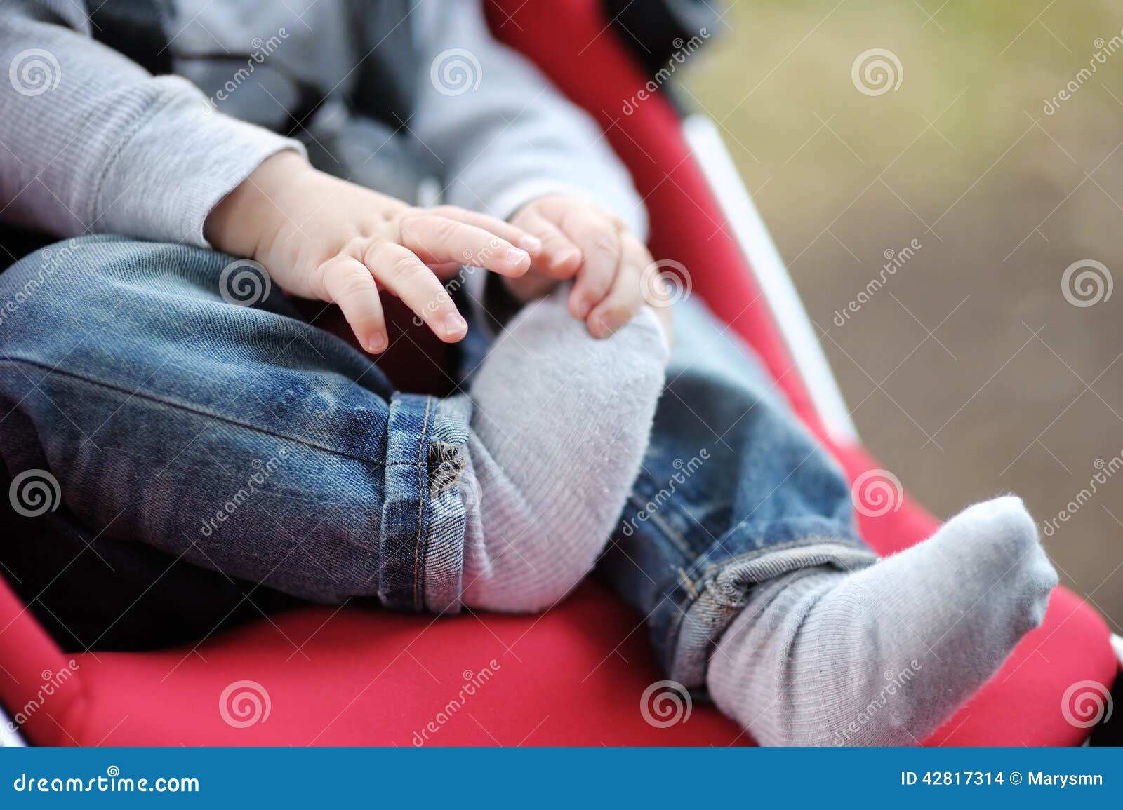 Little Baby Playing with His Sock Stock Photo - Image of outdoors ...