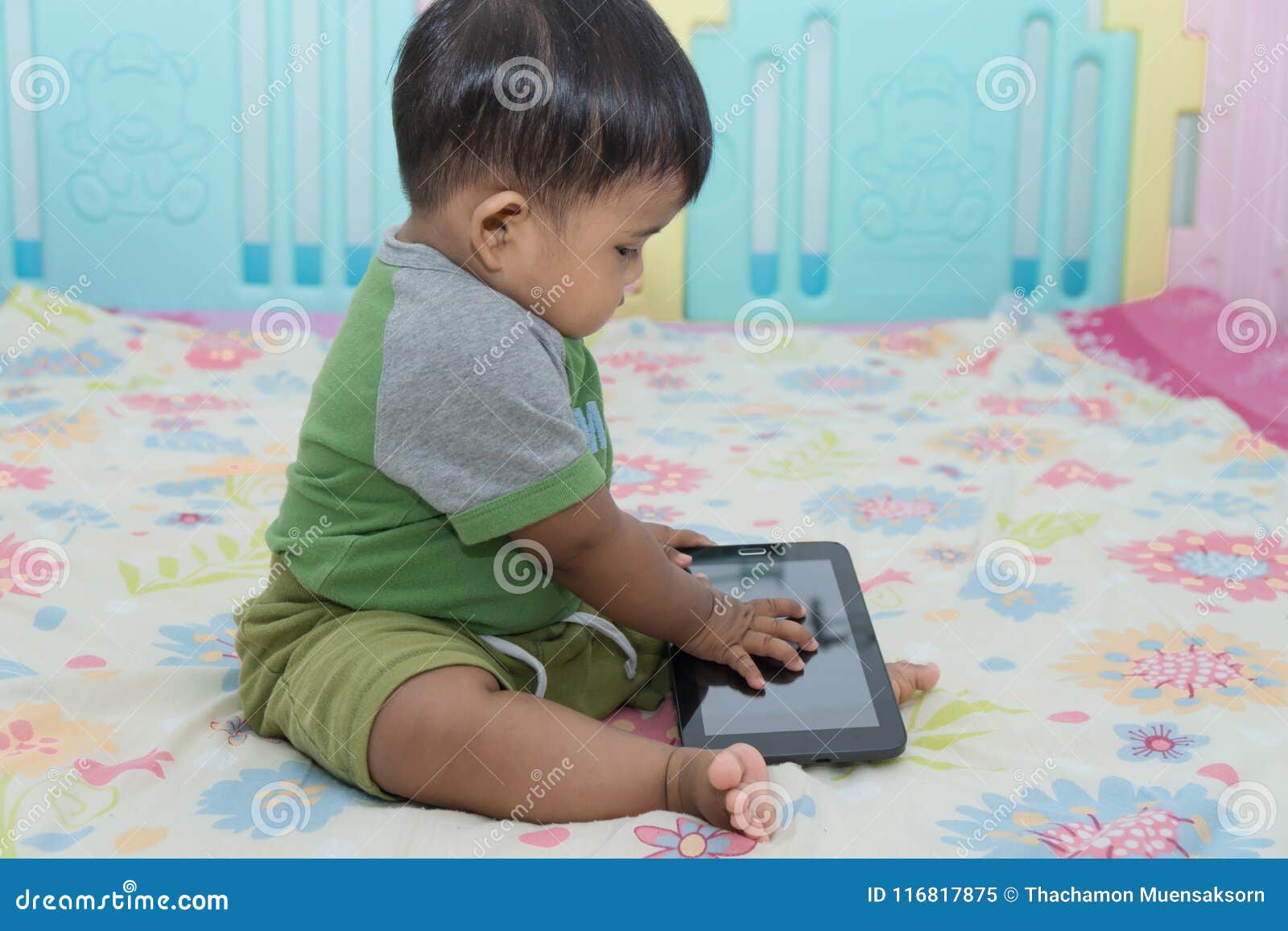 Little baby playing tablet stock image. Image of gadget - 116817875