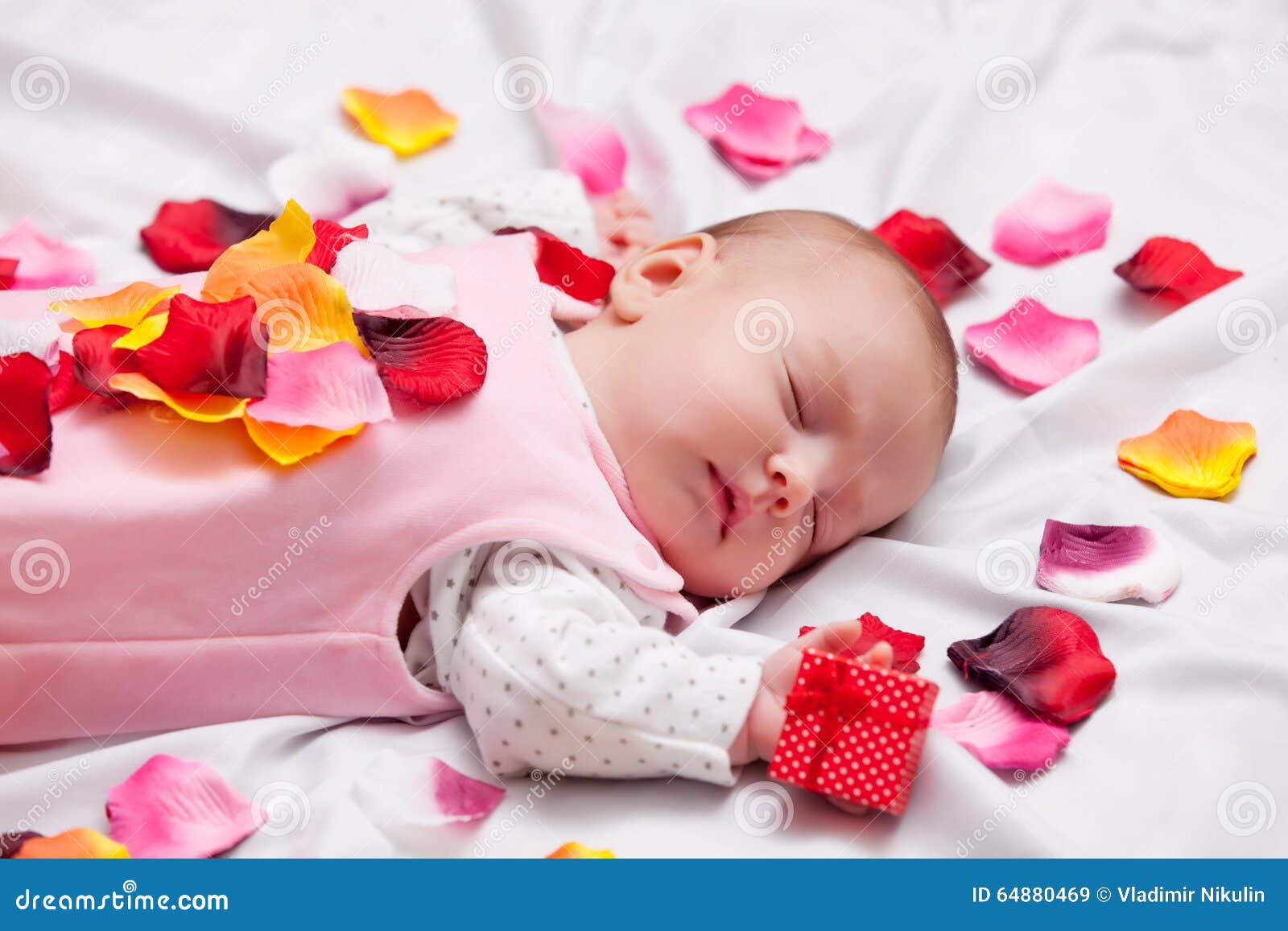 Little Baby with Rose Petals Stock Image - Image of child, cute: 64880469