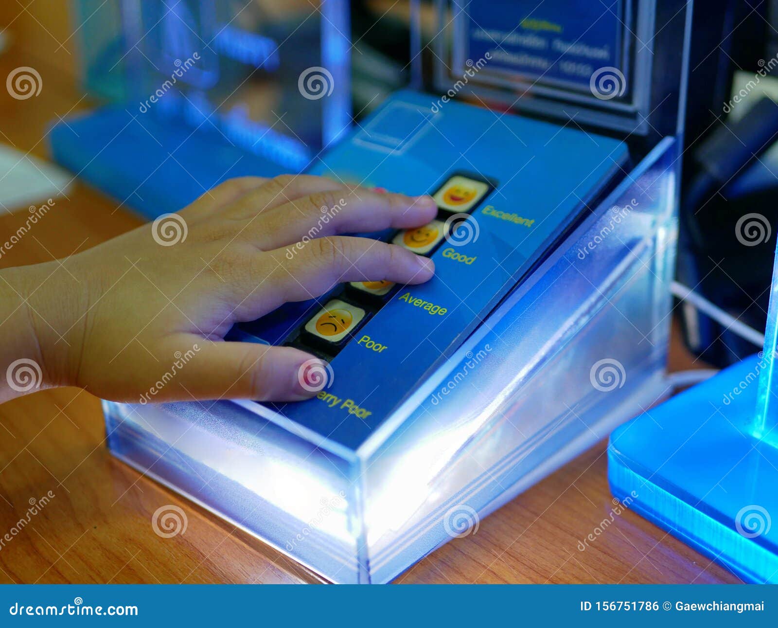 Little Baby`s Hand on a Push Button Feedback Device for Customer`s ...