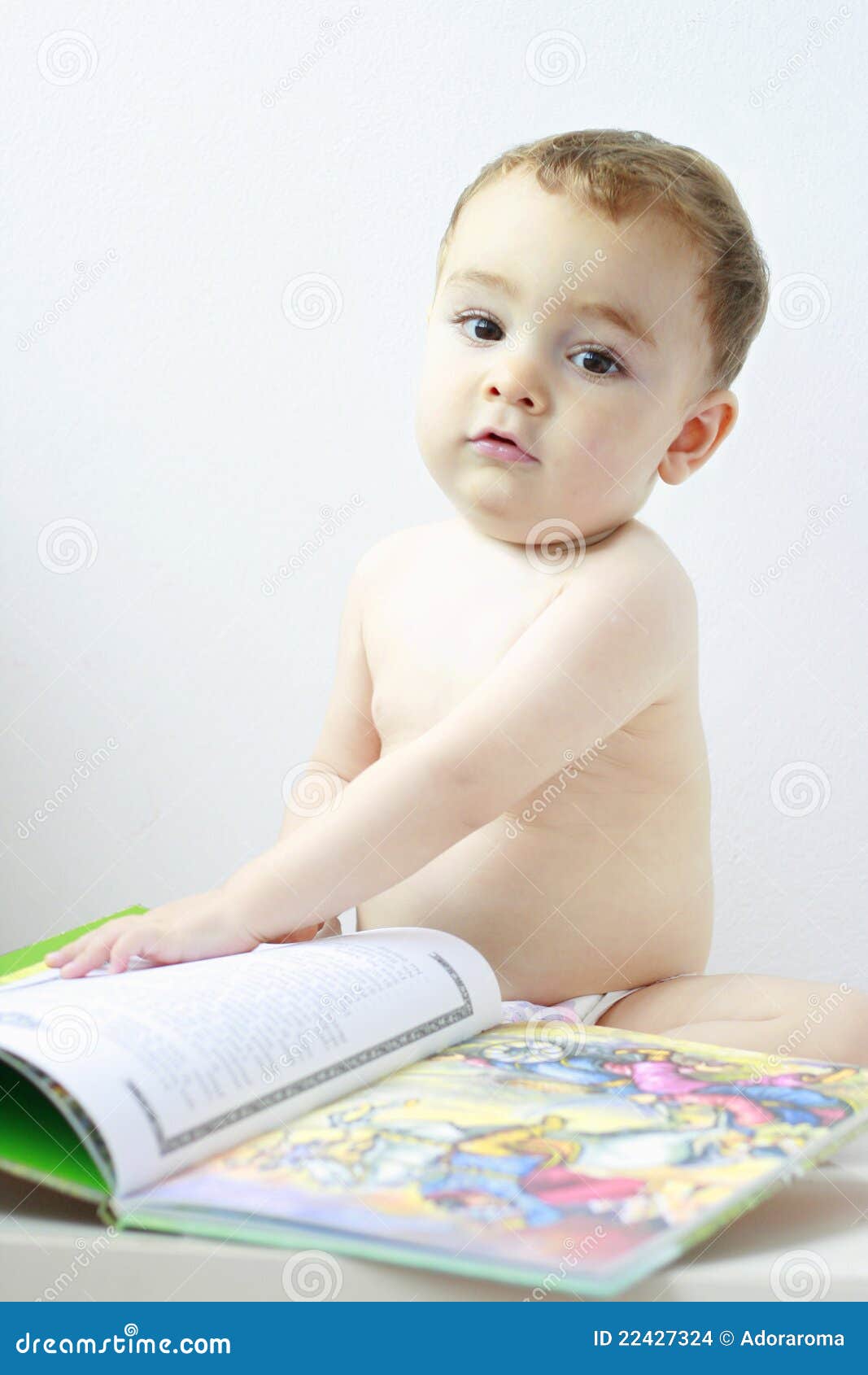 Little Baby Scanning a Big Book Stock Photo - Image of learn, adorable ...