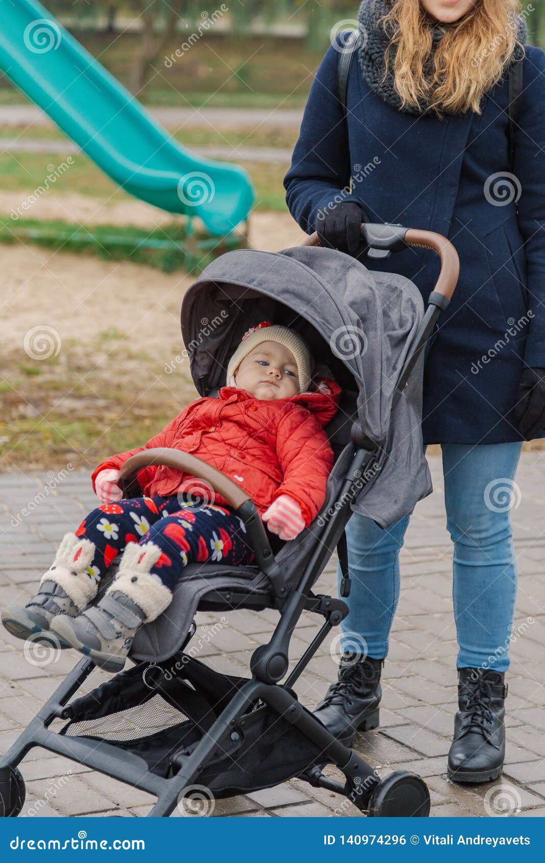 The Little Baby is Sitting in the Pram. Stock Photo - Image of buggy ...