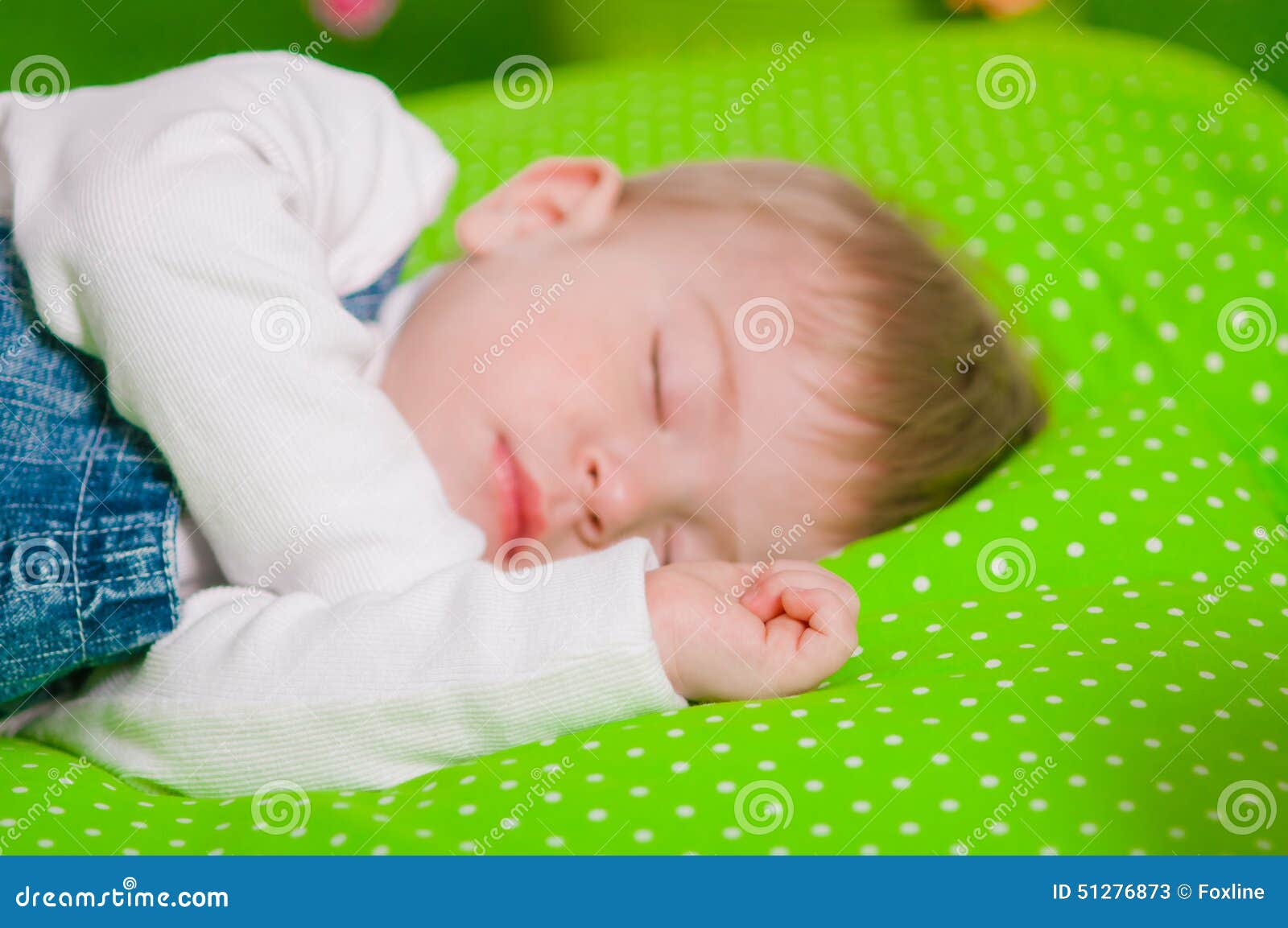 Little Baby Sleeping on Green Cushion Stock Image - Image of city ...