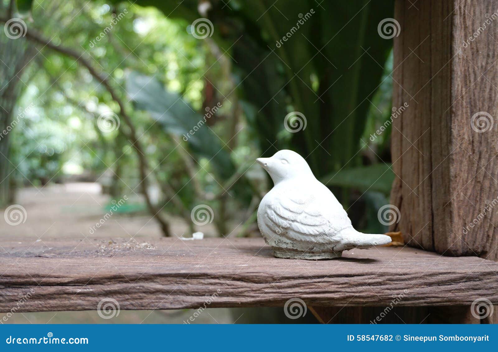 Little Bird Sculpture on the Timber Plank Stock Photo - Image of wood ...
