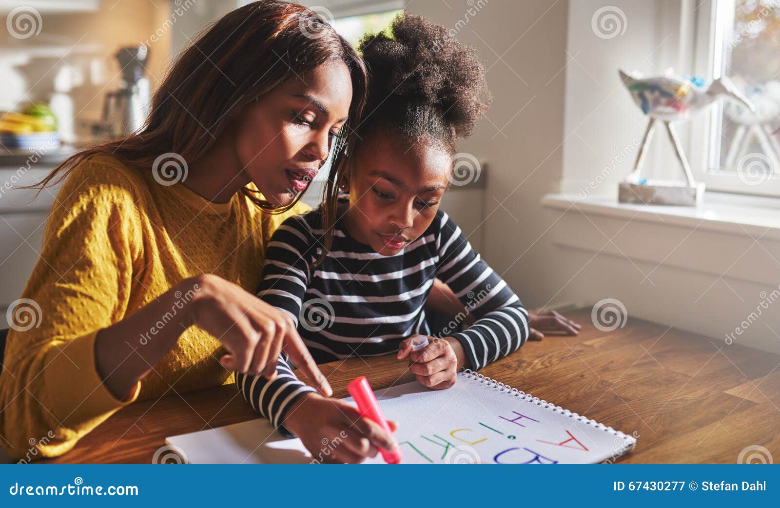 Little Black Girl Learning To Read Stock Image - Image of dining ...