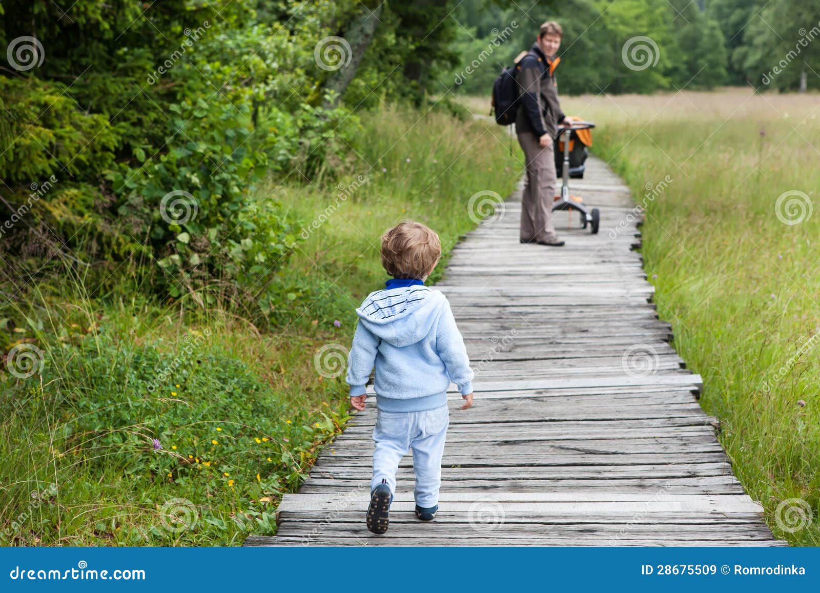 Little Blond Boy and His Father Walking through Nature Park Stock Image ...