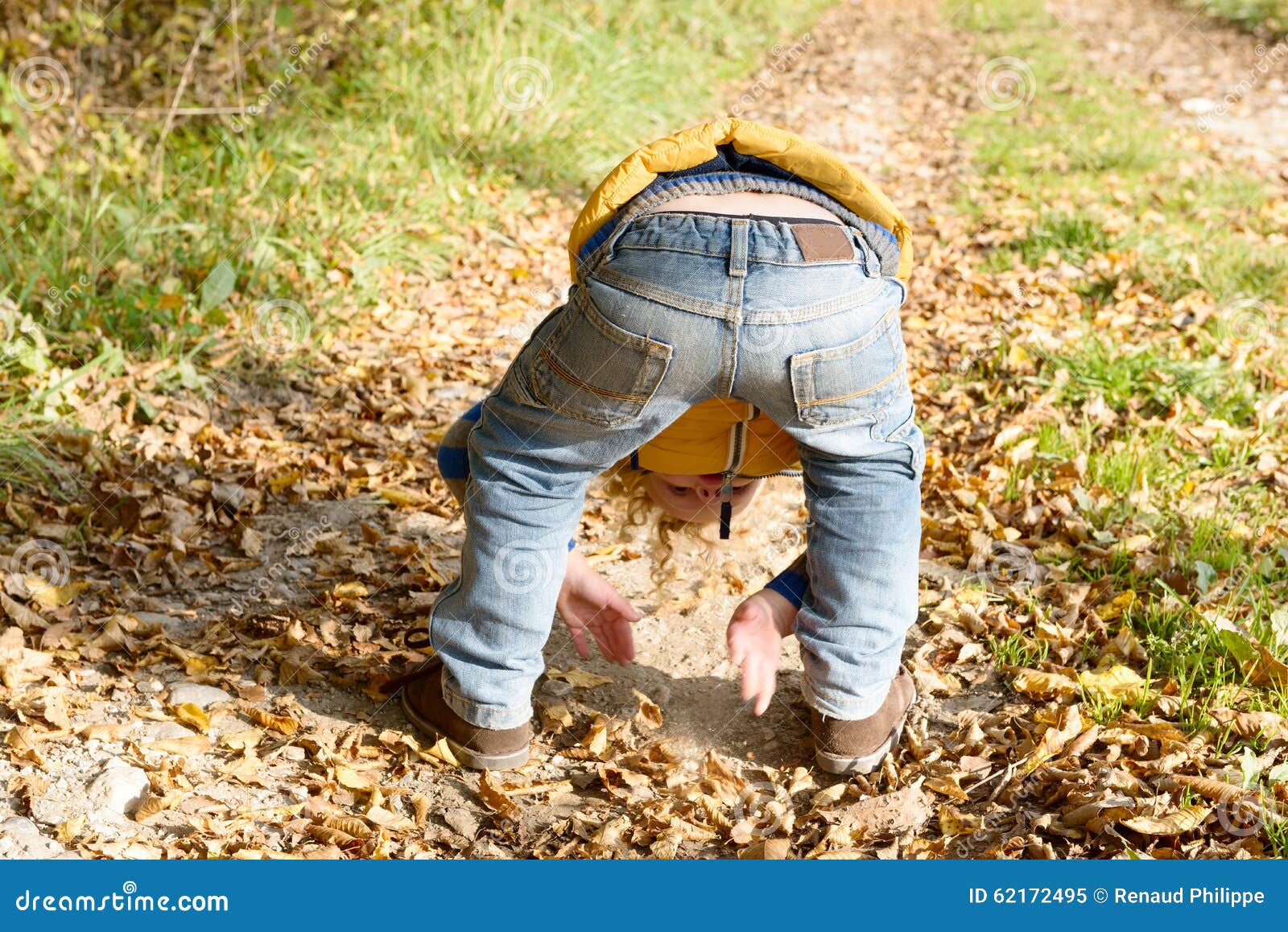 A Little Blond Boy Playing with Dirt Stock Image - Image of yellow ...