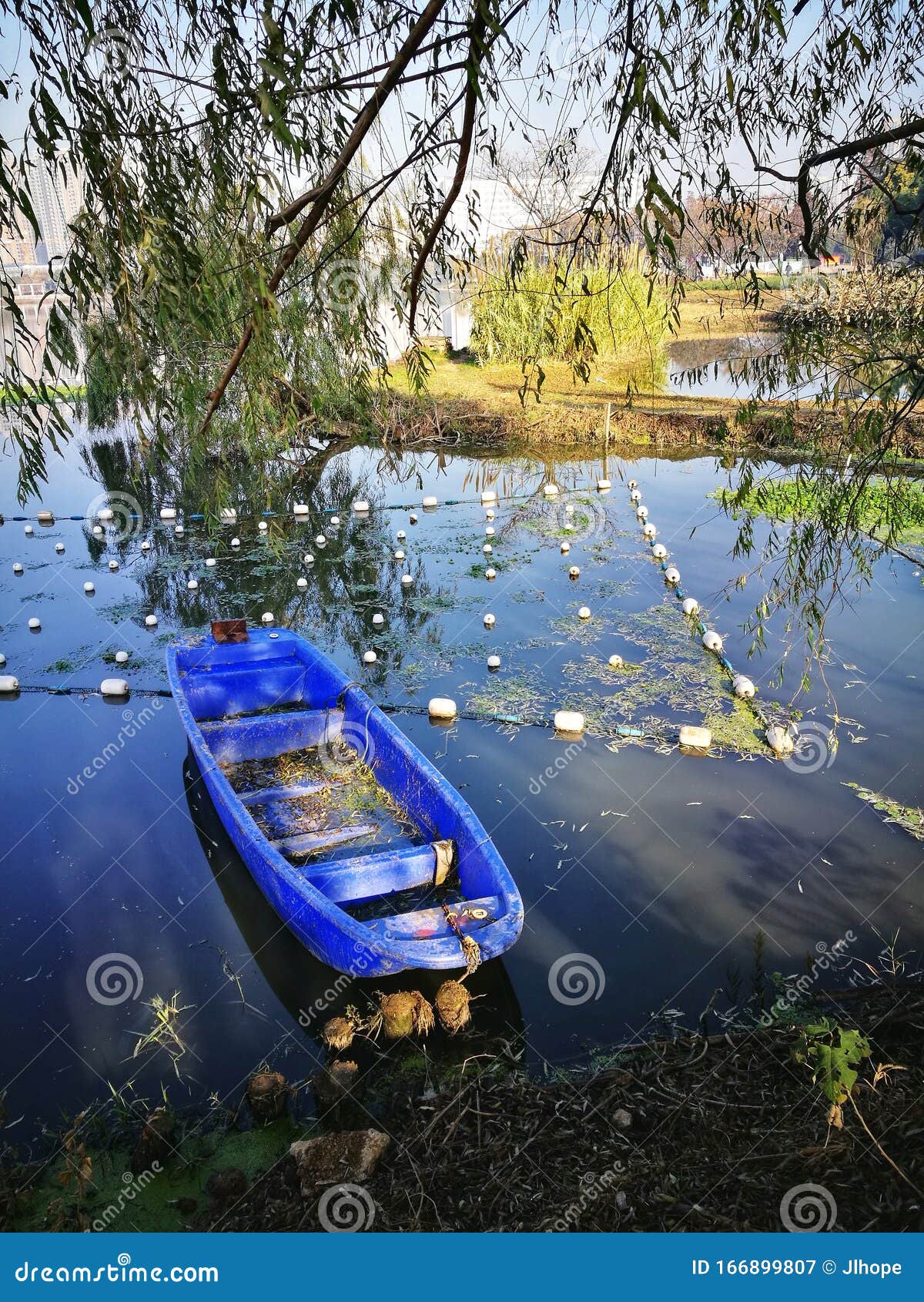 Little Blue Boat on Peaceful Lake Stock Image - Image of blue, lake ...
