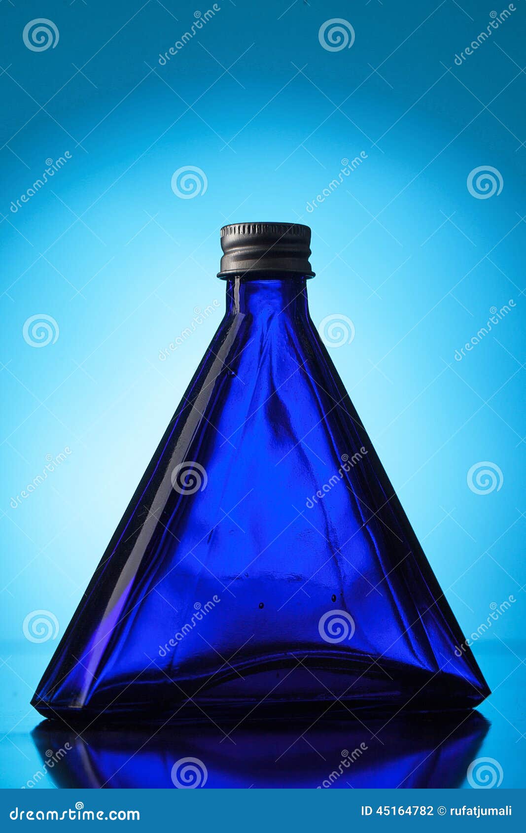 Little Blue Bottles on a Background Stock Photo - Image of plastic ...
