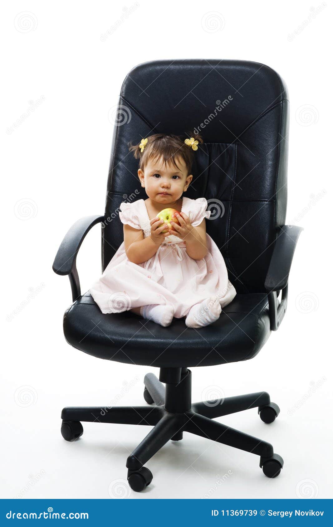 Little Boss. Group Of Four Business Colleagues In Suits Working On ...