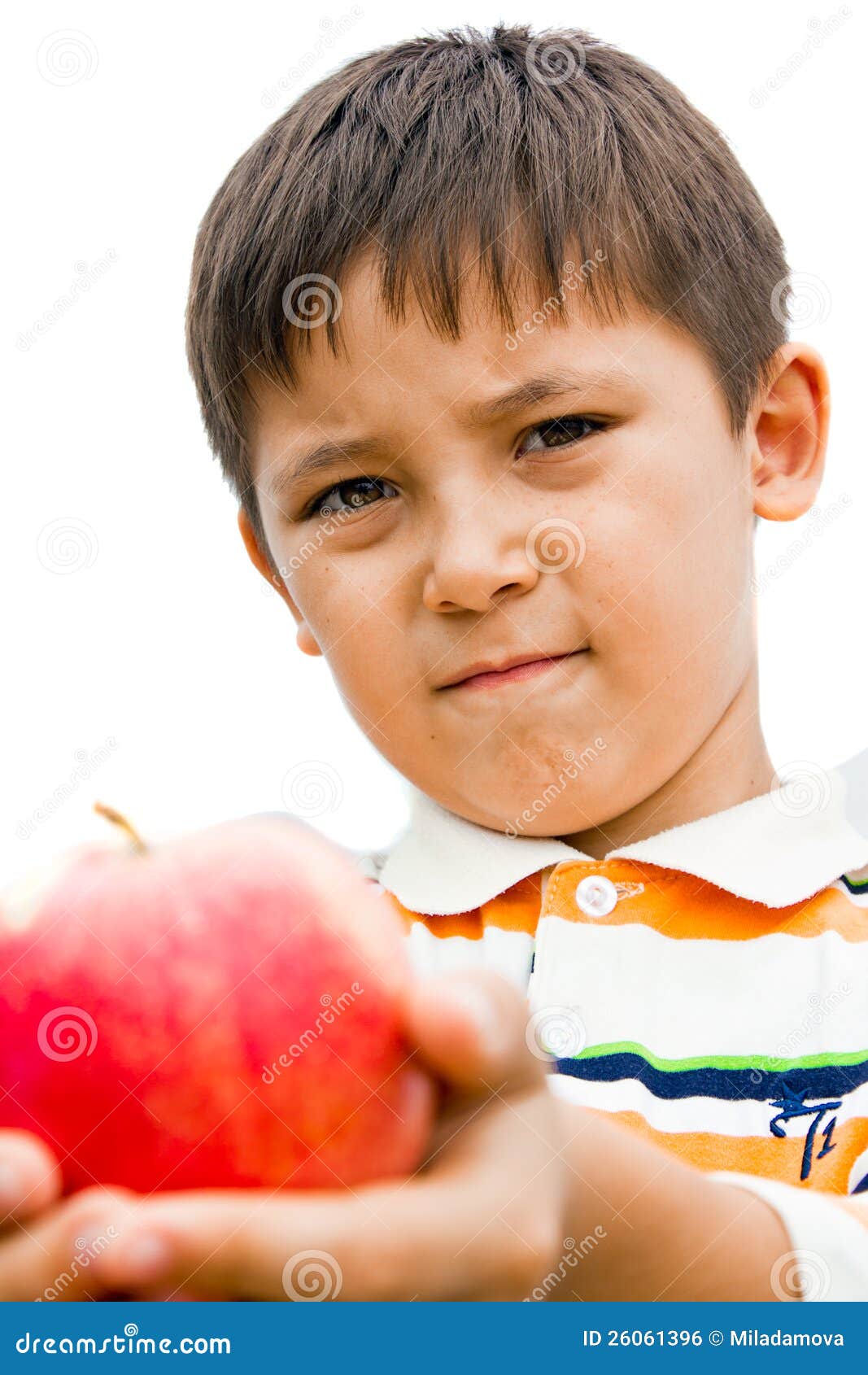 A little boy with an apple stock photo. Image of boys - 26061396