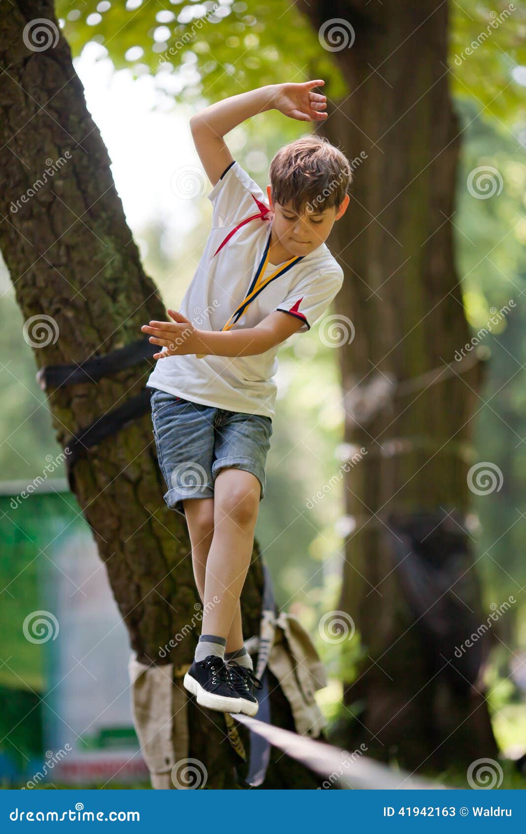 Little Boy Balancing on a Tightrope Stock Image - Image of outdoors ...