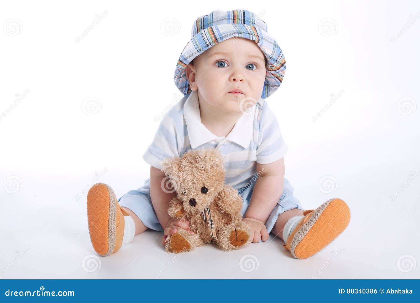 Little boy with bear toy stock photo. Image of model - 80340386