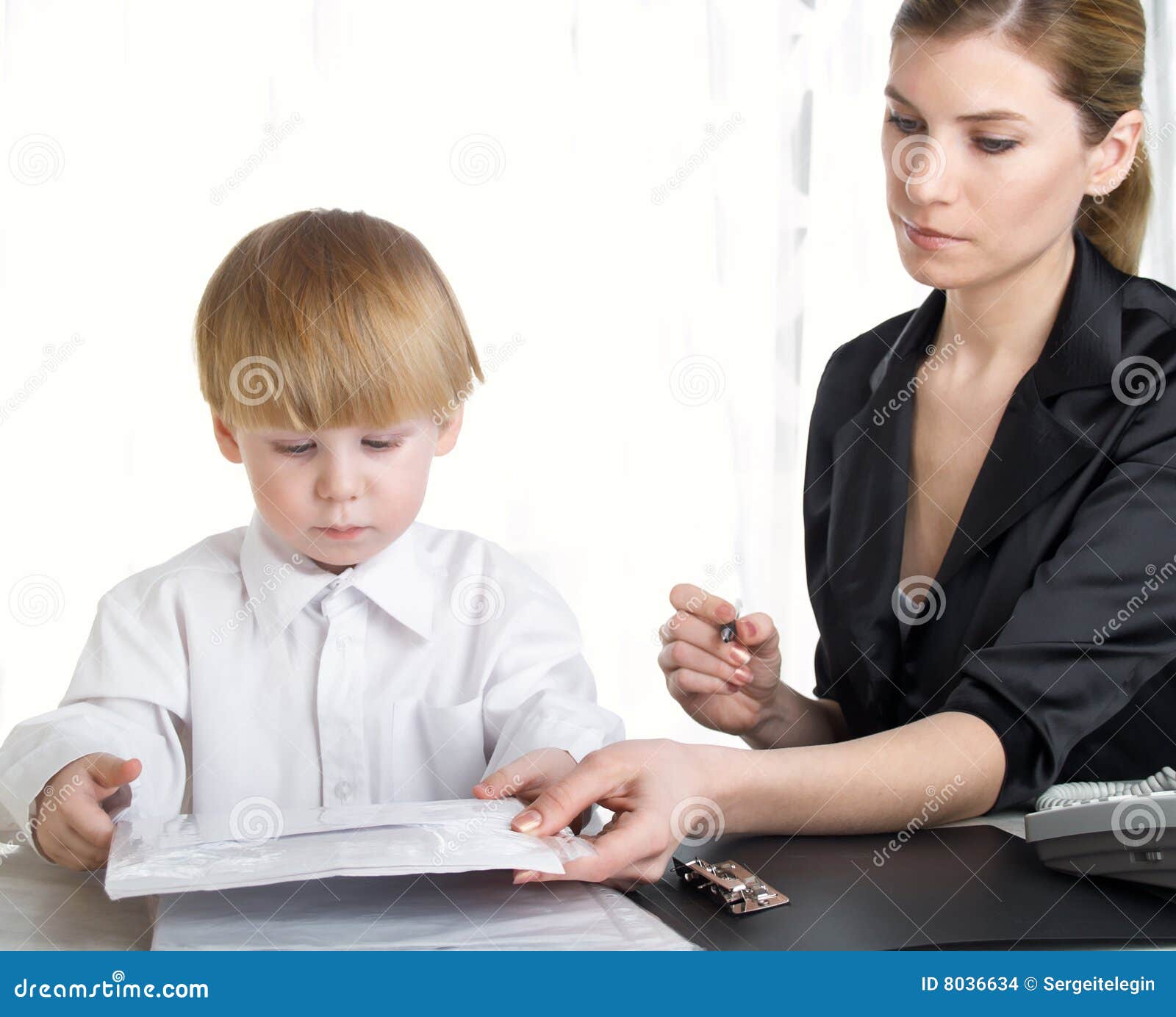 The Little Boy the Big Boss Stock Photo - Image of table, secretary ...