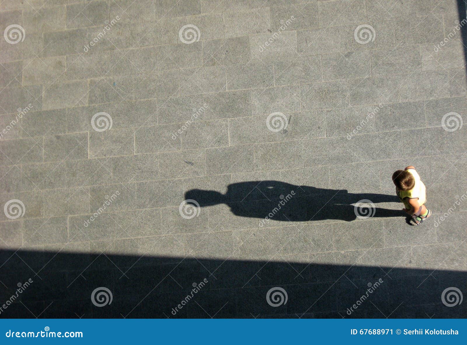 Little boy and big shadow stock image. Image of phenomenon - 67688971