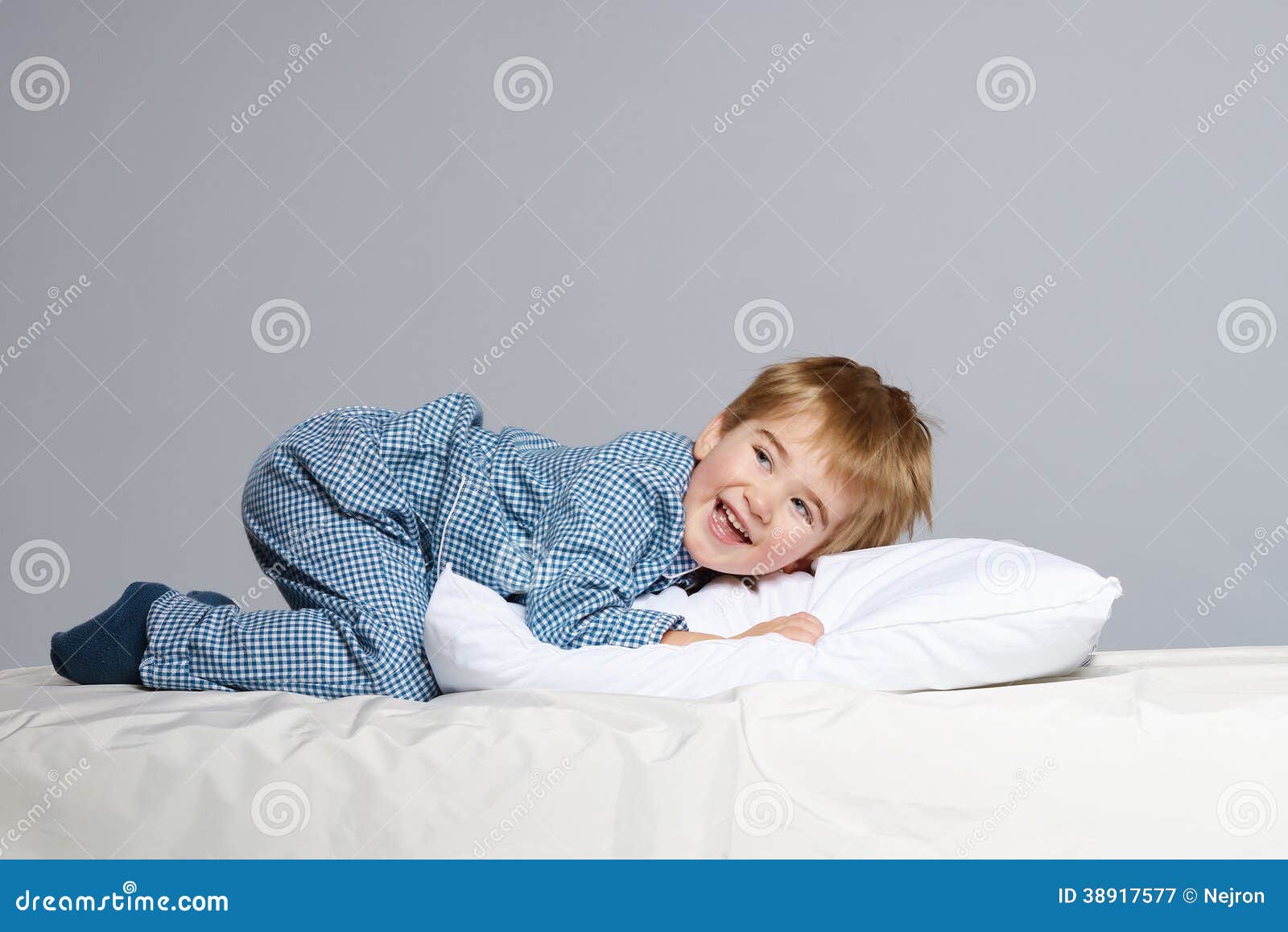 Little boy in blue pyjamas stock image. Image of child - 38917577