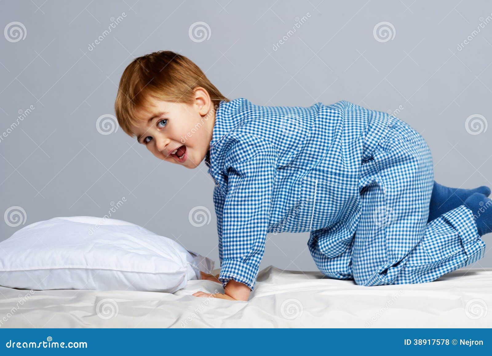 Little boy in blue pyjamas stock photo. Image of person - 38917578