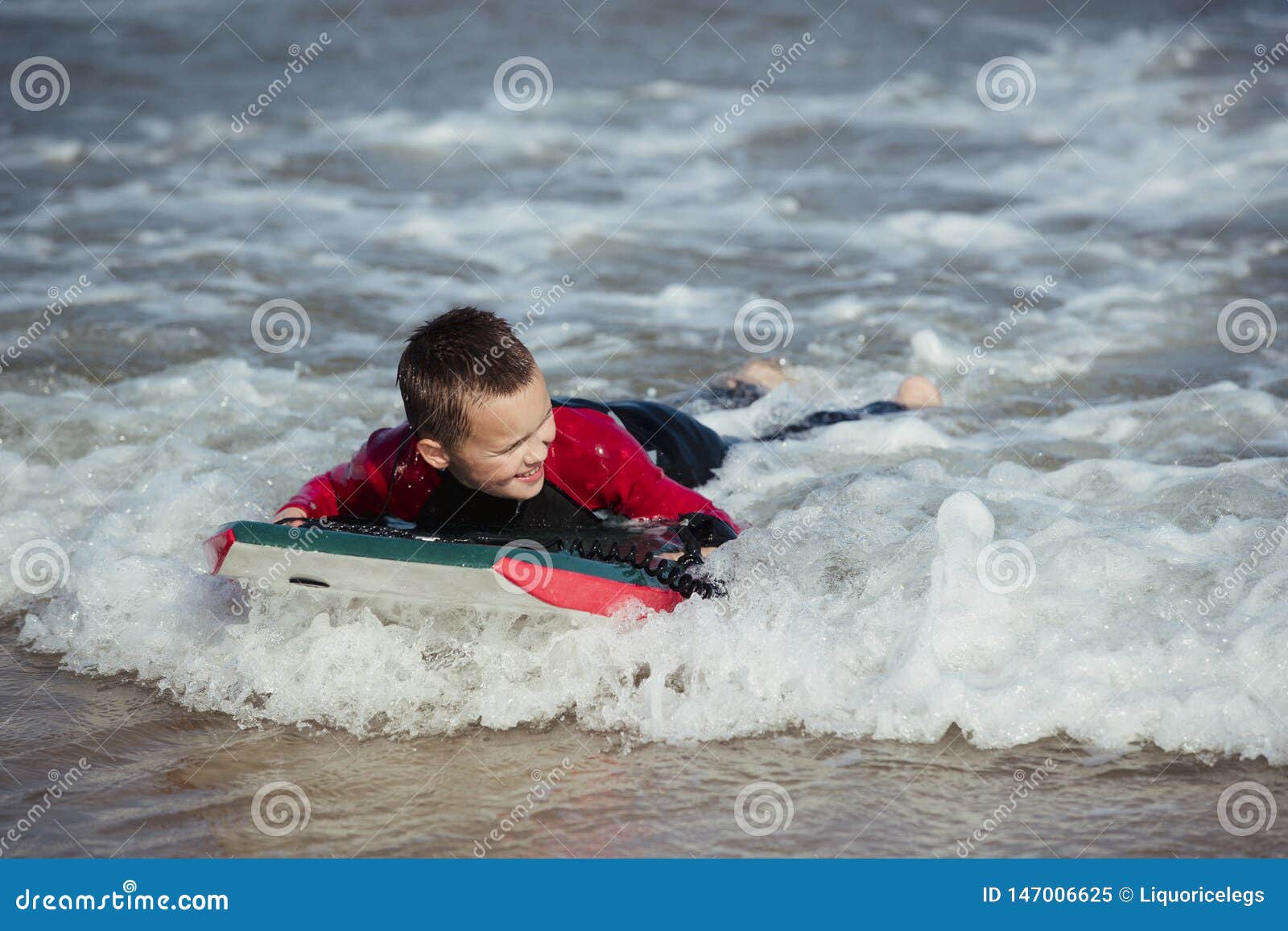 Little Boy Bodyboarding in the Sea Stock Image - Image of lifestyles ...