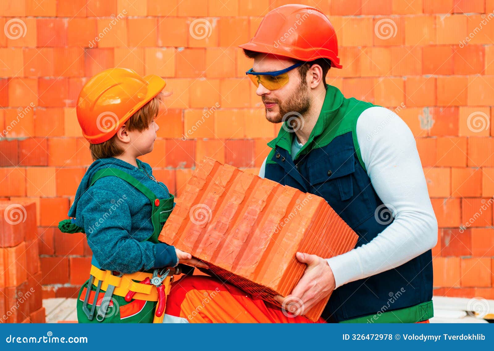 Little Boy Bricklayer. Brothers are Building Together Stock Photo ...