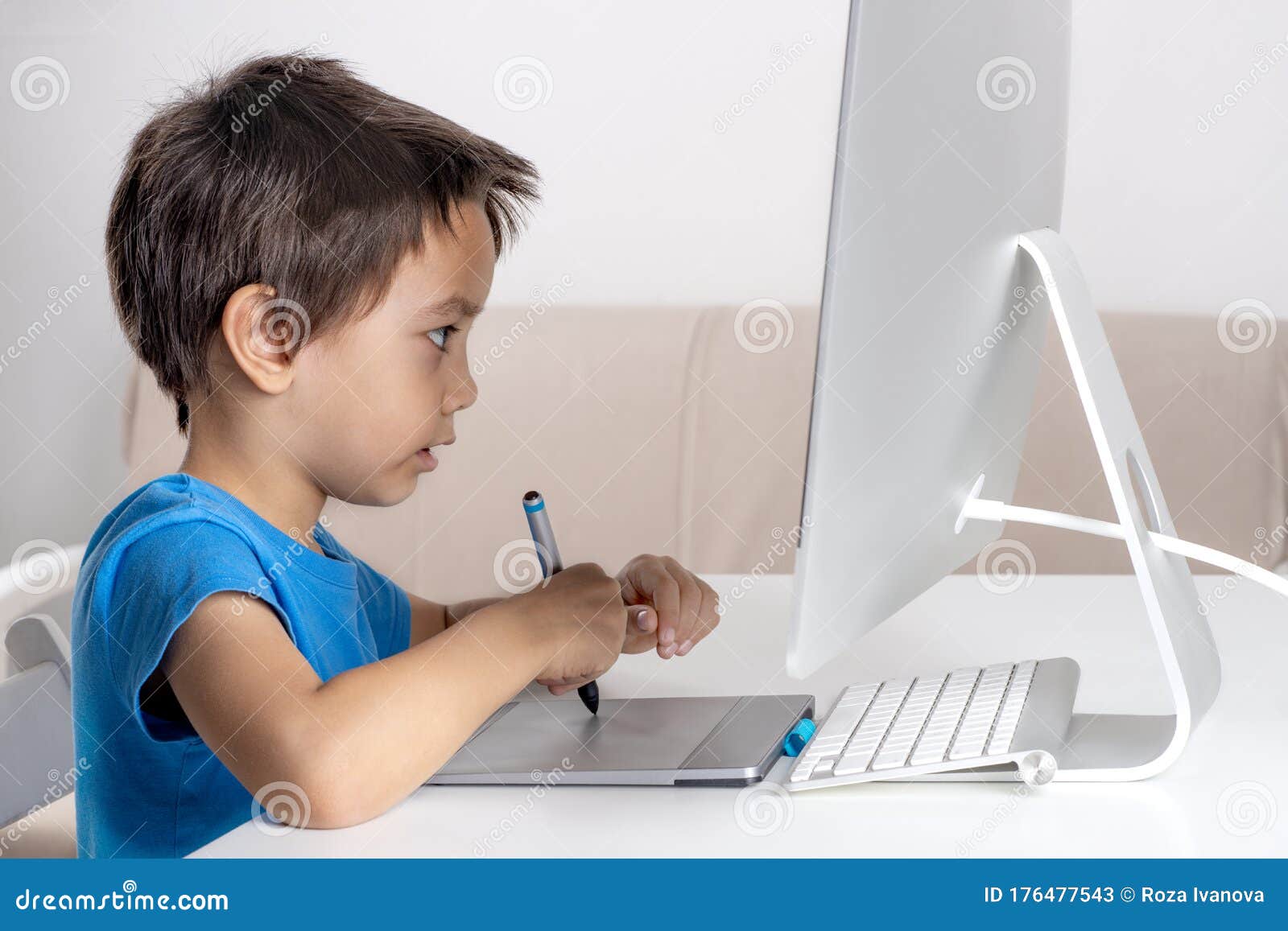 Little Boy Browses the Internrt on a Desktop Computer. Modern Lifestyle ...