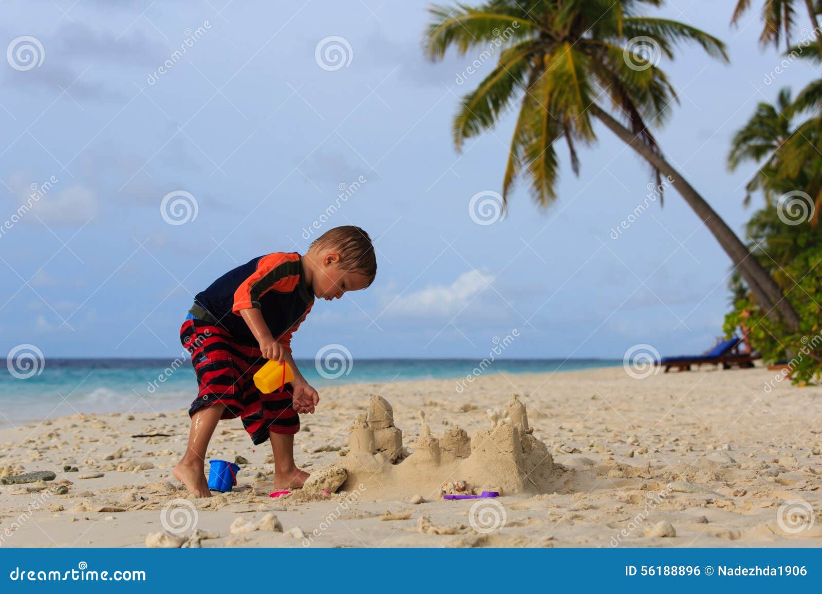 Little Boy Building Sand Castle on Tropical Beach Stock Photo - Image ...