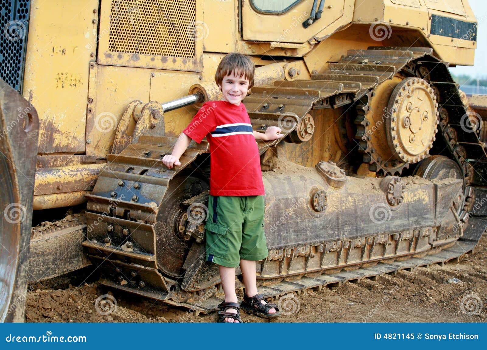 Little Boy And Bulldozer Picture. Image: 4821145