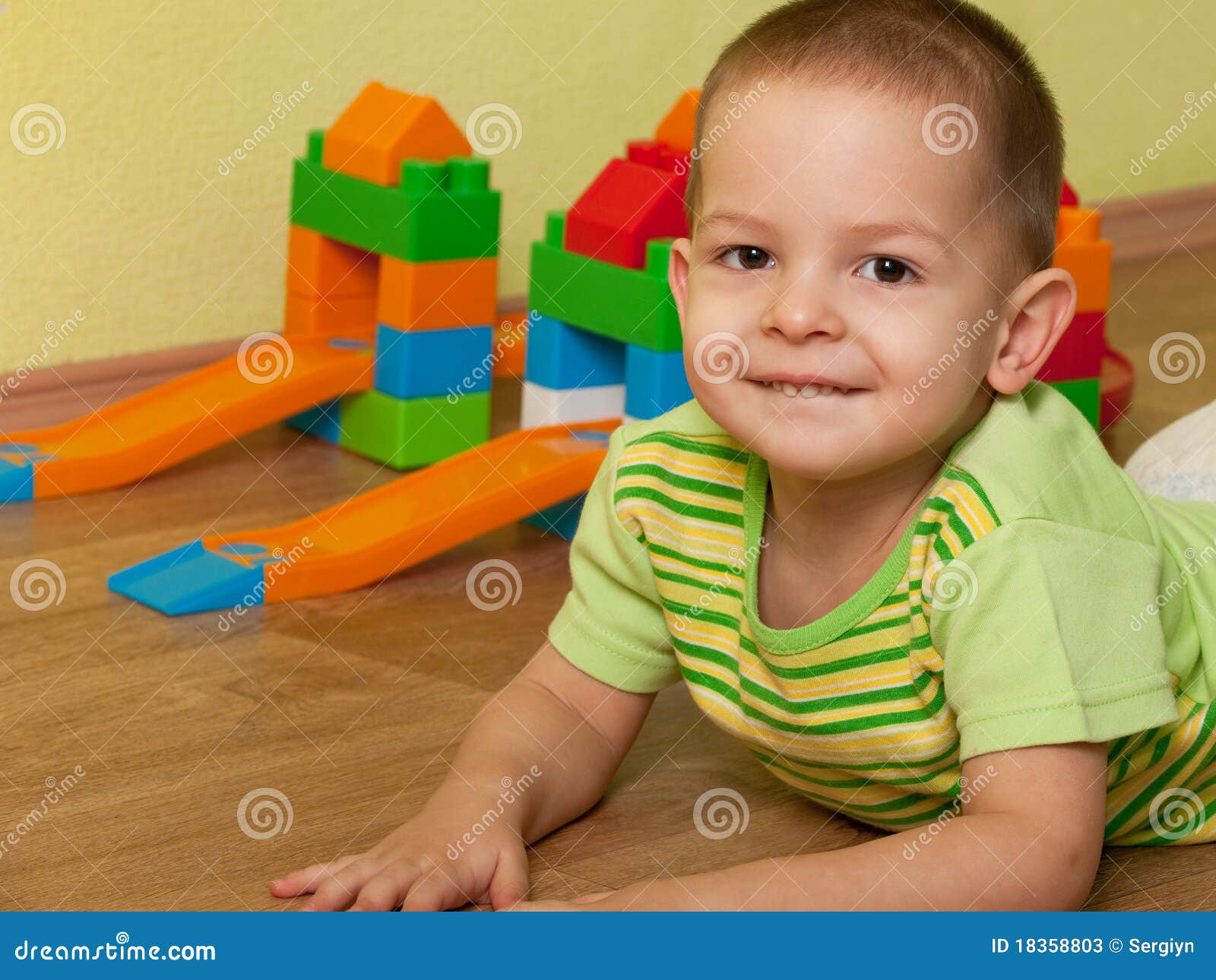 Little Boy at the Car Track Stock Image - Image of kindergarten, floor ...
