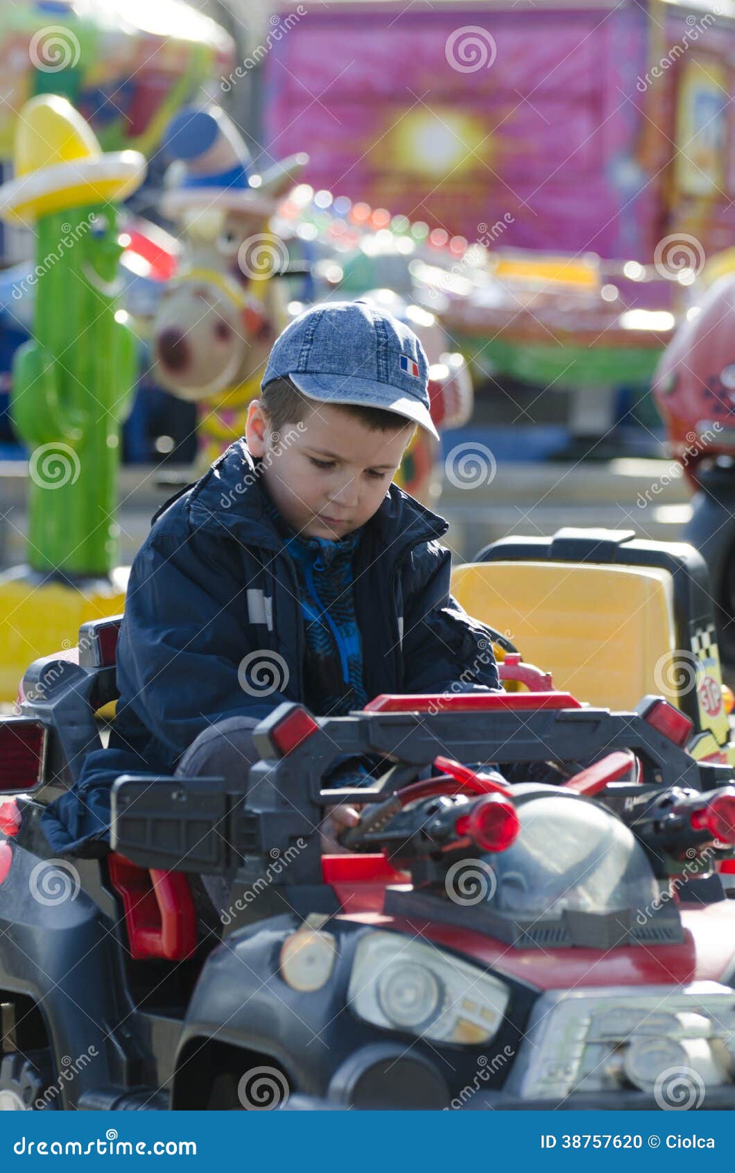 Little boy in carousel car stock photo. Image of auto - 38757620
