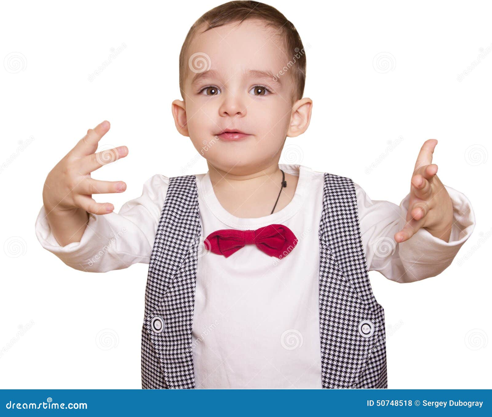Little Boy in a Checkered Suit and Bow Tie Throws His Hands Stock Photo ...