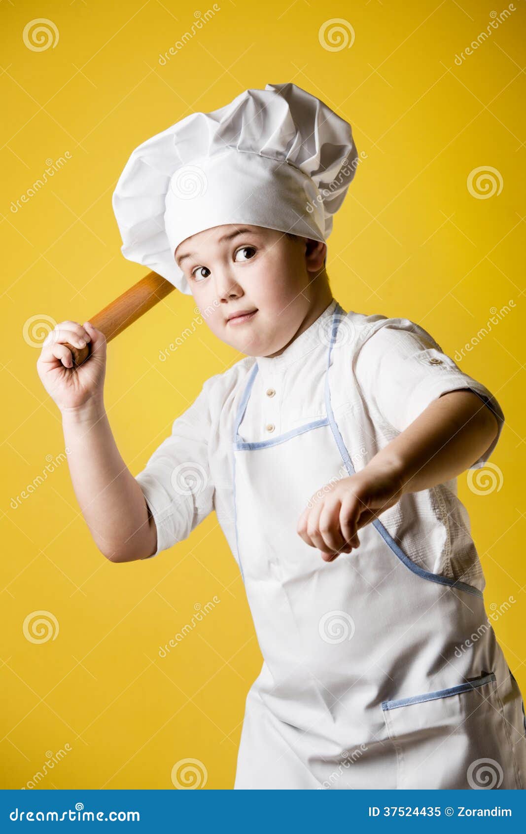 Little boy chef in uniform stock image. Image of cooking - 37524435
