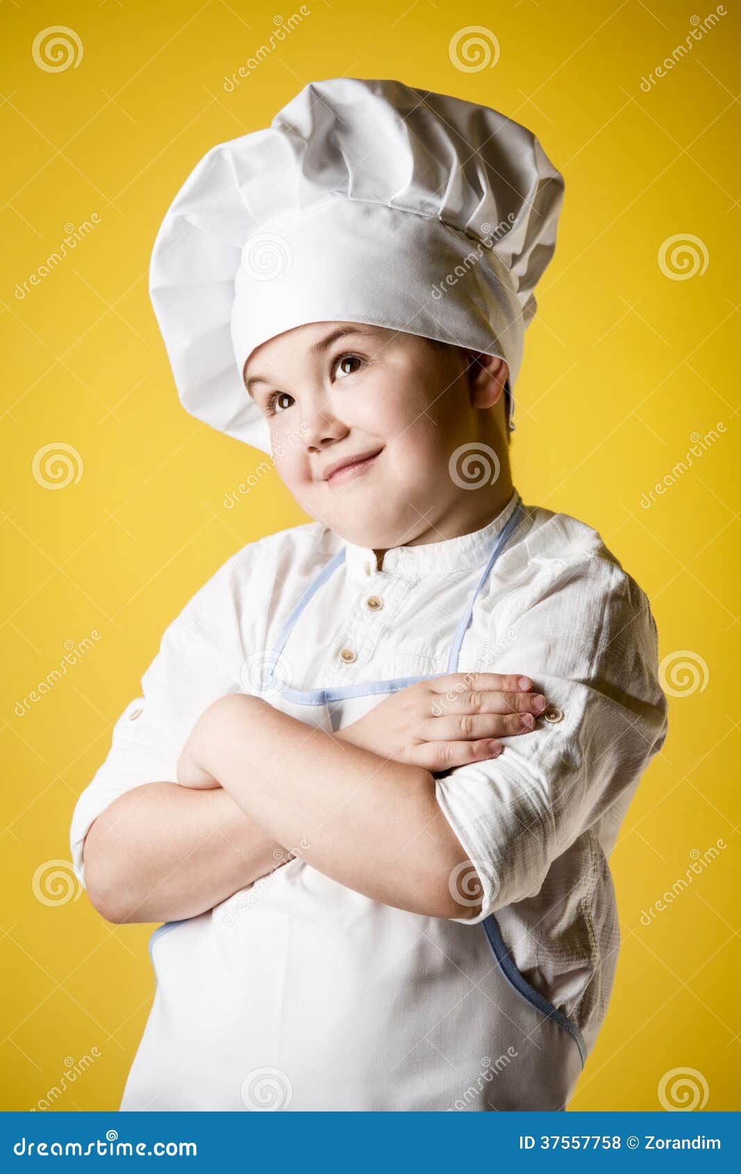 Little boy chef in uniform stock photo. Image of cooking - 37557758