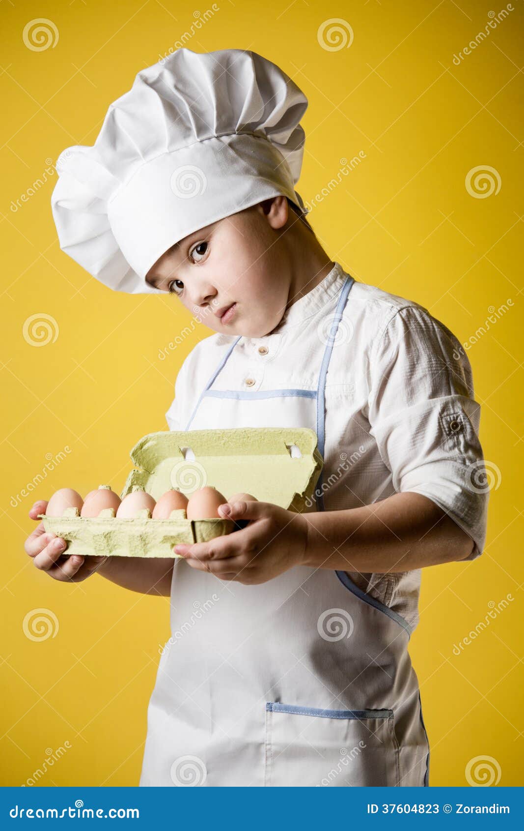 Little boy chef in uniform stock image. Image of kitchen - 37604823