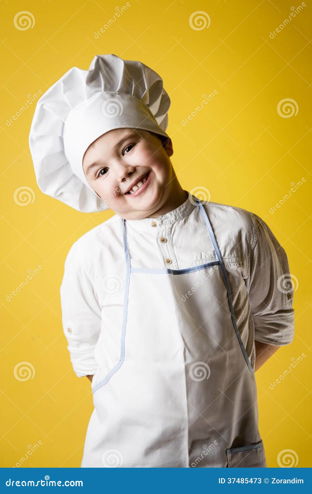 Little boy chef in uniform stock image. Image of happy - 37485473