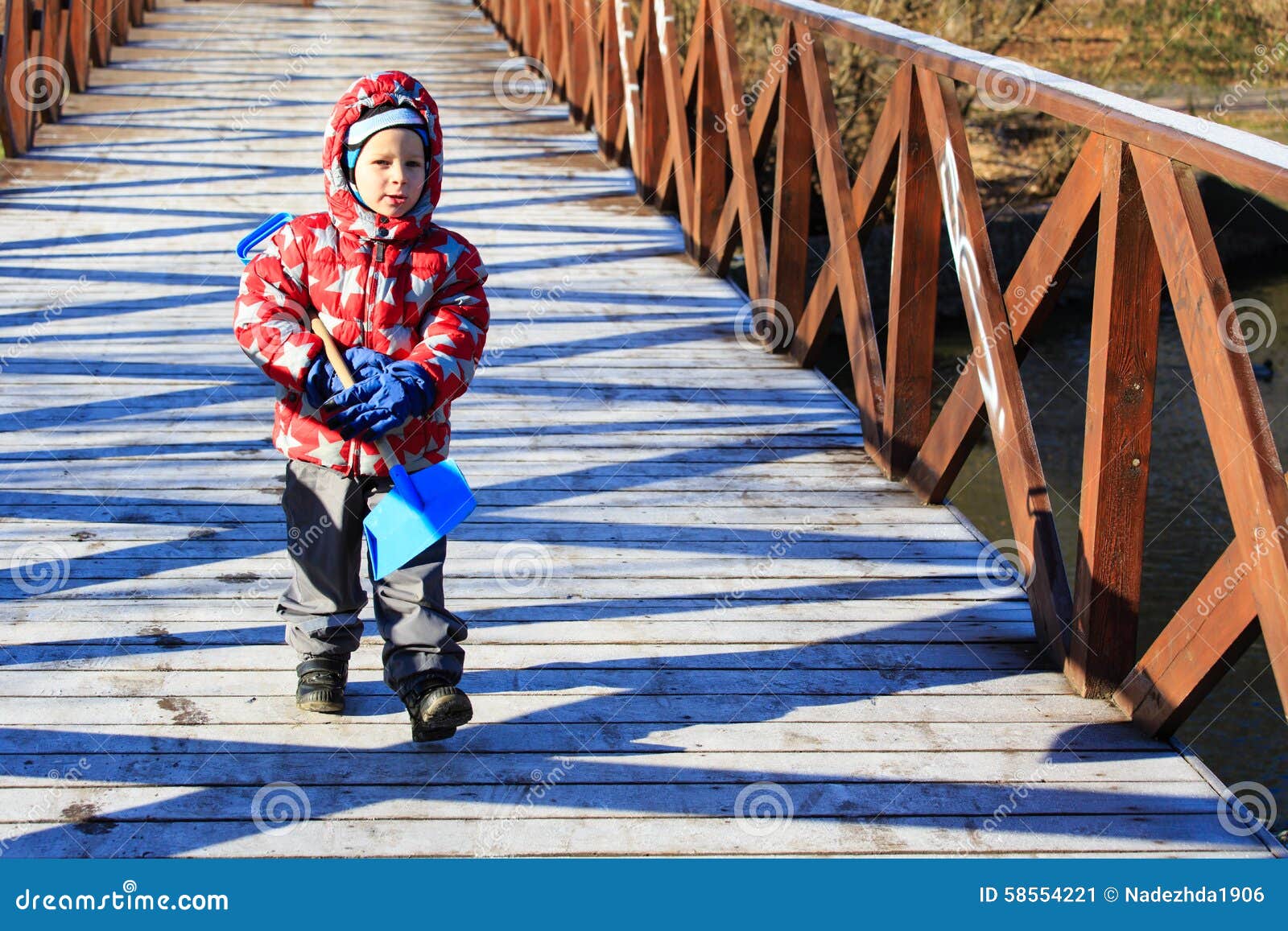 Little Boy Cleaning Snow Outdoors Stock Image - Image of outdoors ...