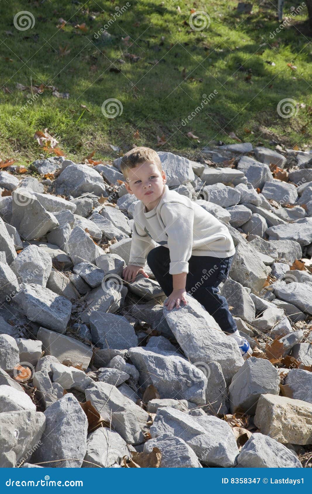 Boy climbing on rocks stock image. Image of rocky, lovable - 8358347