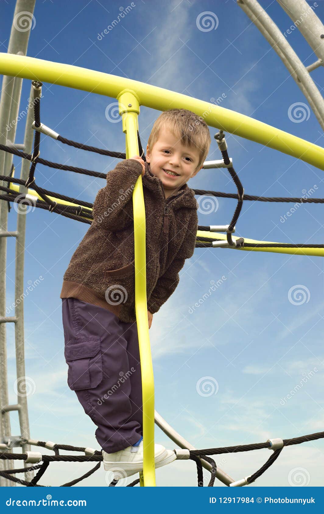Little Boy on a Climbing Frame Stock Photo - Image of frame, park: 12917984